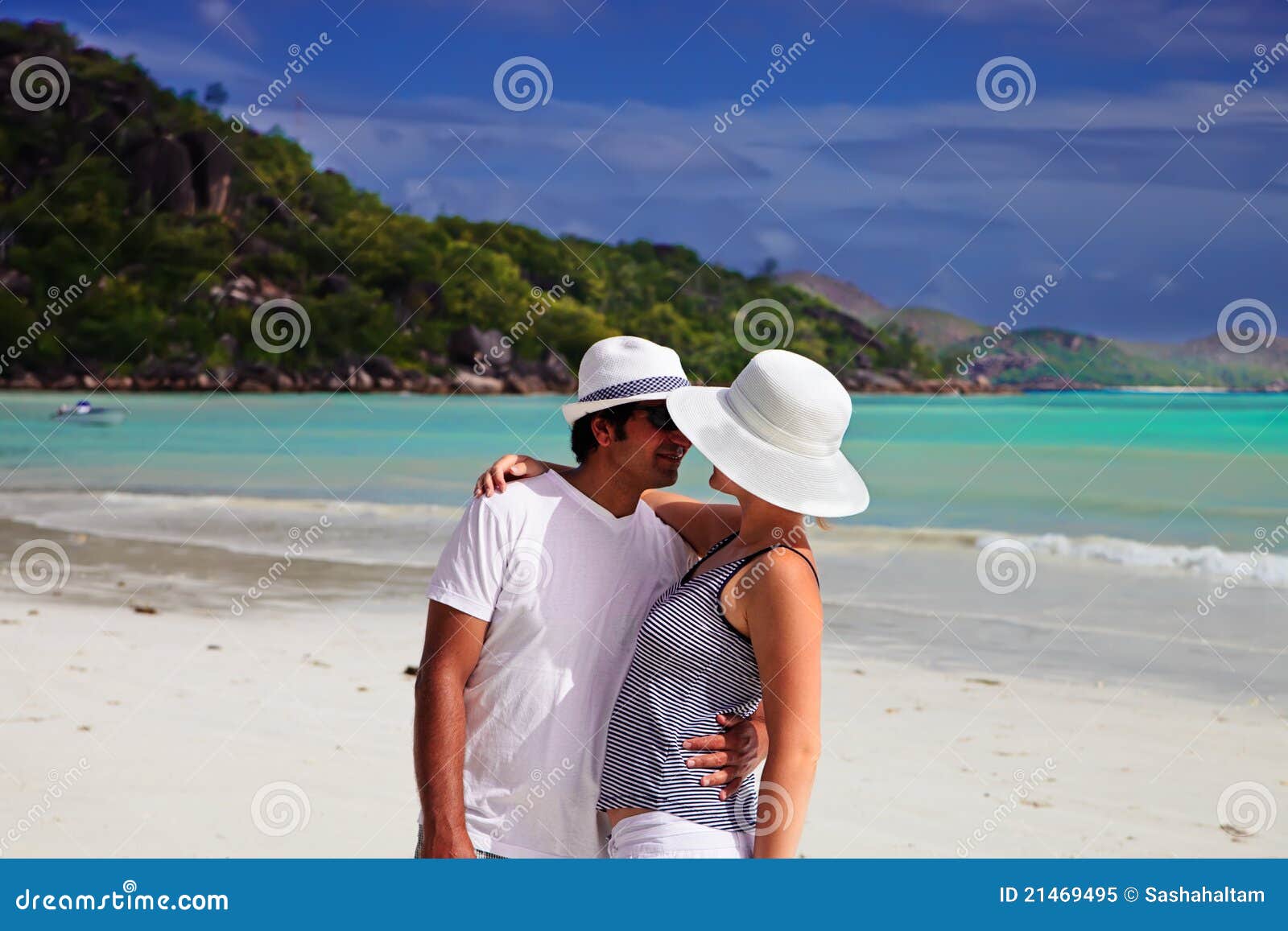 Couple kissing on a beach stock image. Image of vacation - 21469495