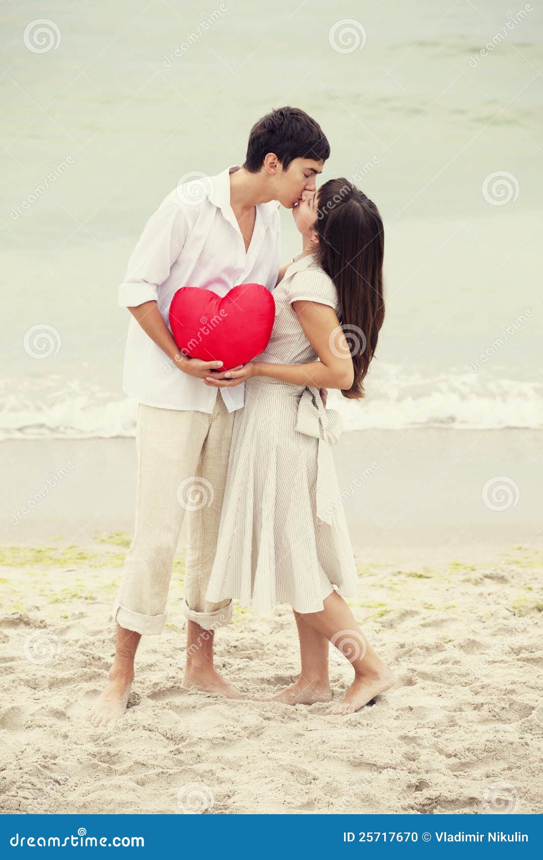 Couple Kissing at the Beach Stock Photo - Image of female, beach: 25717670