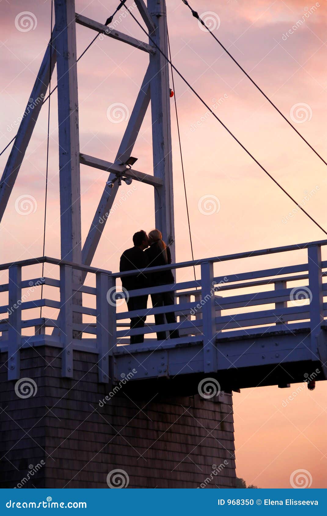 Couple kissing on a bridge stock photo. Image of love, couple - 968350