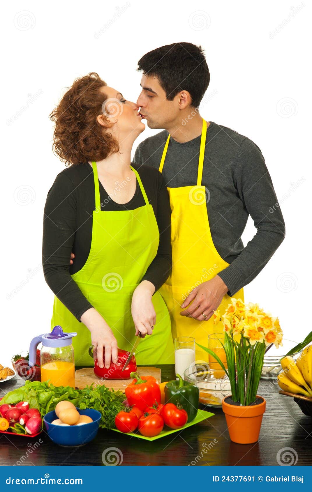 Couple kissing in kitchen stock image. Image of baking - 24377691