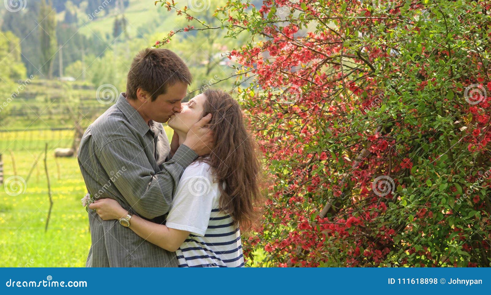 Couple kissing in spring l stock photo. Image of caucasian - 111618898