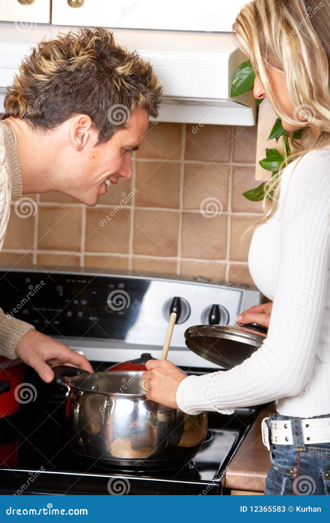 Couple at kitchen stock image. Image of lifestyle, couple - 12365583