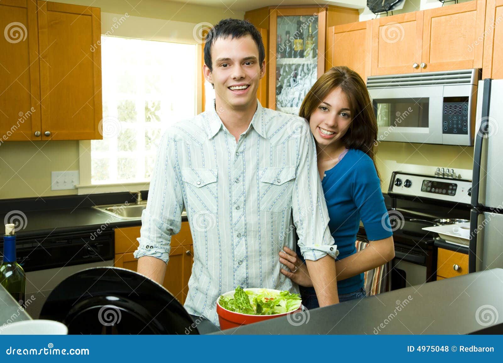 Couple in kitchen stock photo. Image of male, brunettes - 4975048