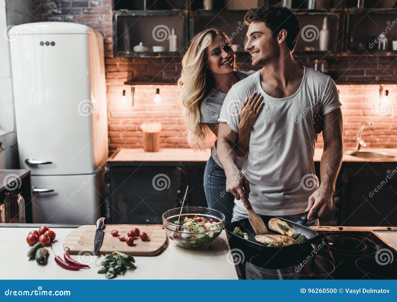 Couple on kitchen stock photo. Image of cheerful, couple - 96260500