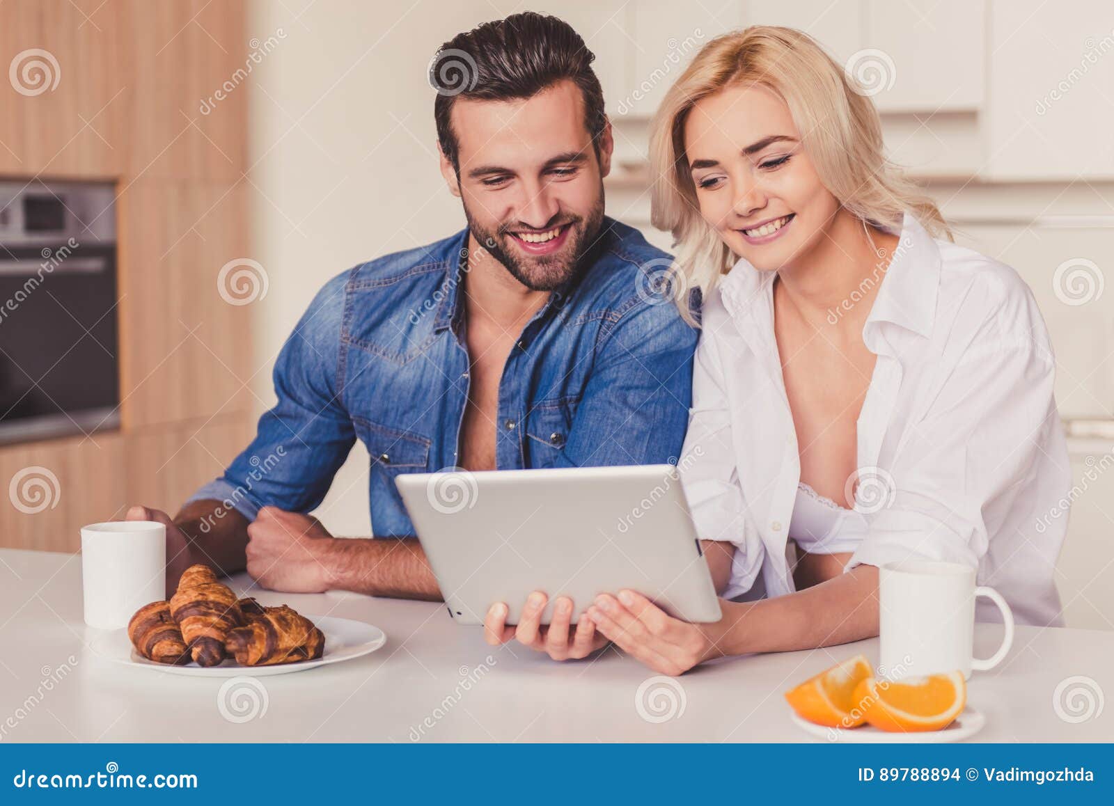 Couple in kitchen stock photo. Image of communicate, lovers - 89788894