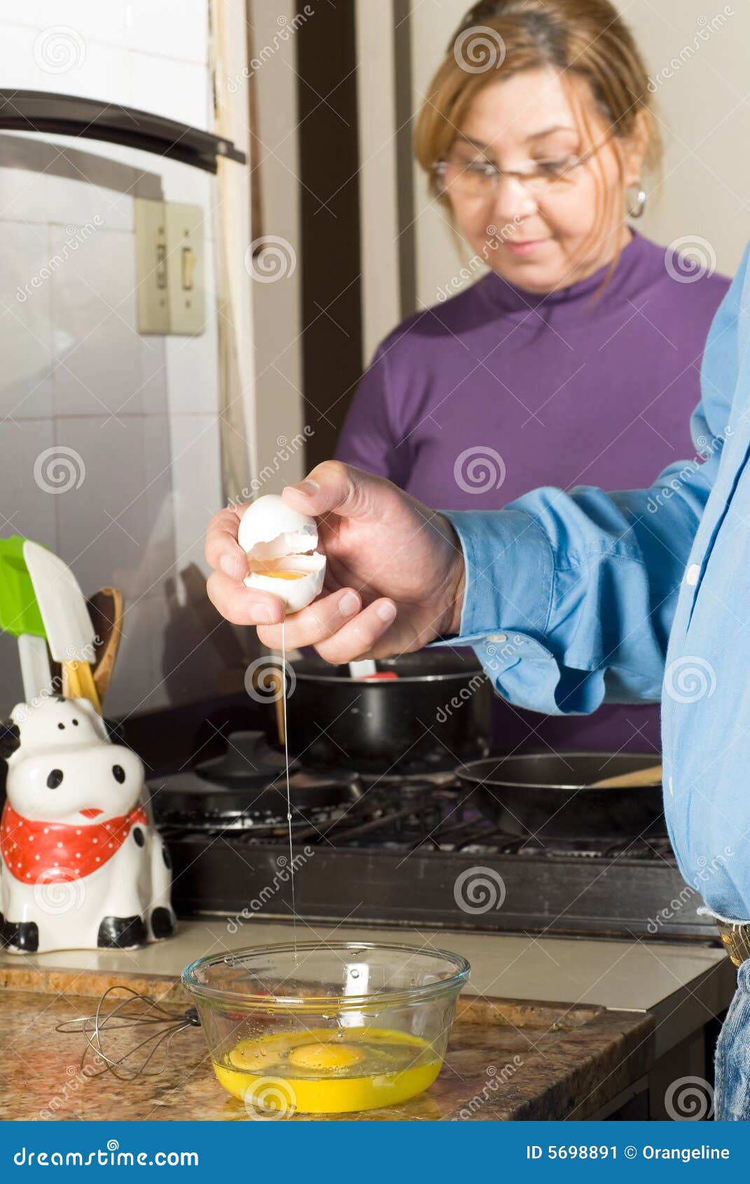 Couple in Kitchen Making Breakfast - Vertical Stock Image - Image of ...