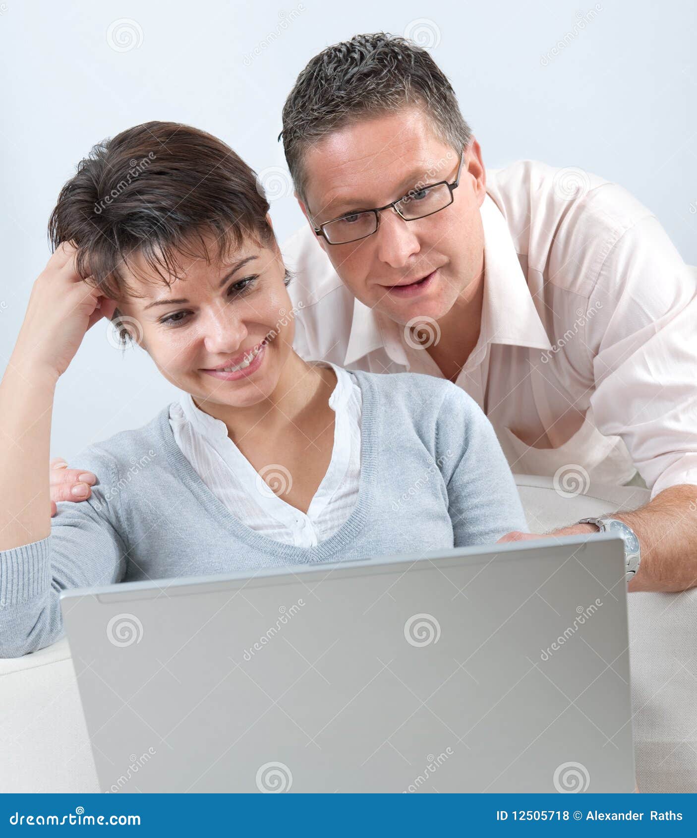 Couple on laptop stock photo. Image of modern, leisure - 12505718