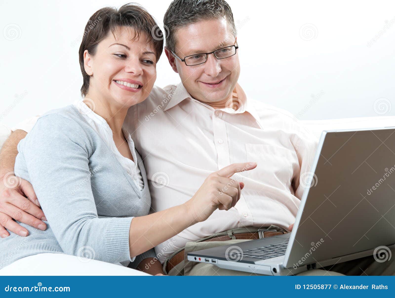 Couple on laptop stock image. Image of line, couple, house - 12505877