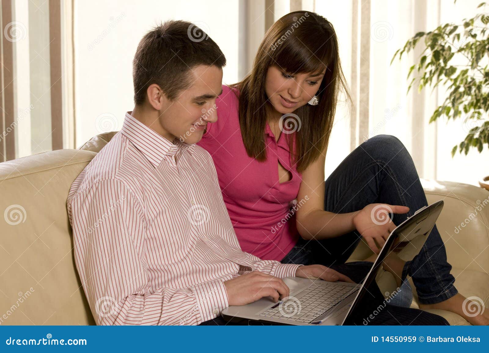 Couple with Laptop stock image. Image of community, beautiful - 14550959