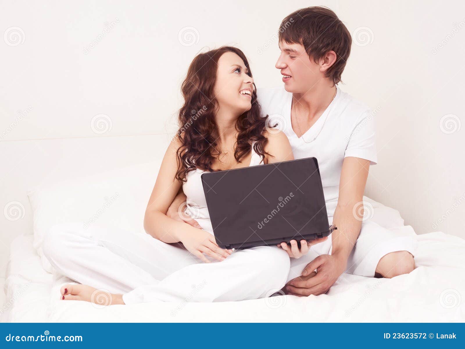 Couple with laptop stock photo. Image of husband, romance - 23623572