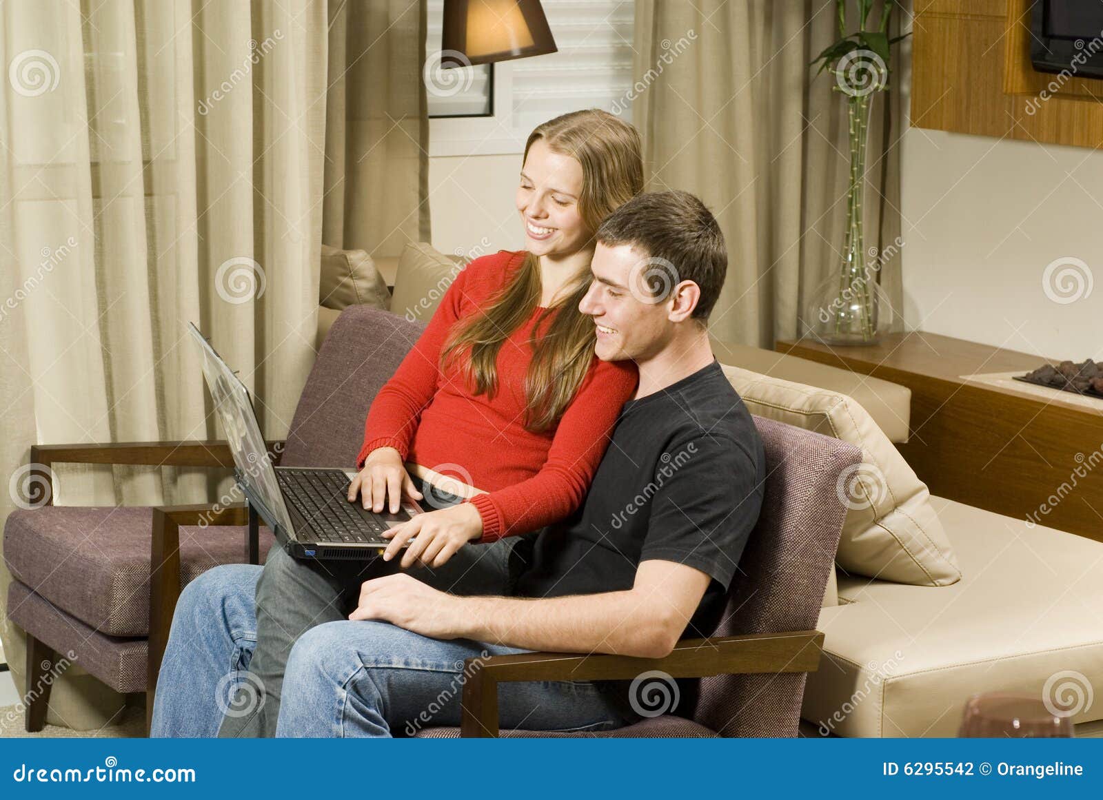 Couple with Laptop stock photo. Image of indoors, beautiful - 6295542