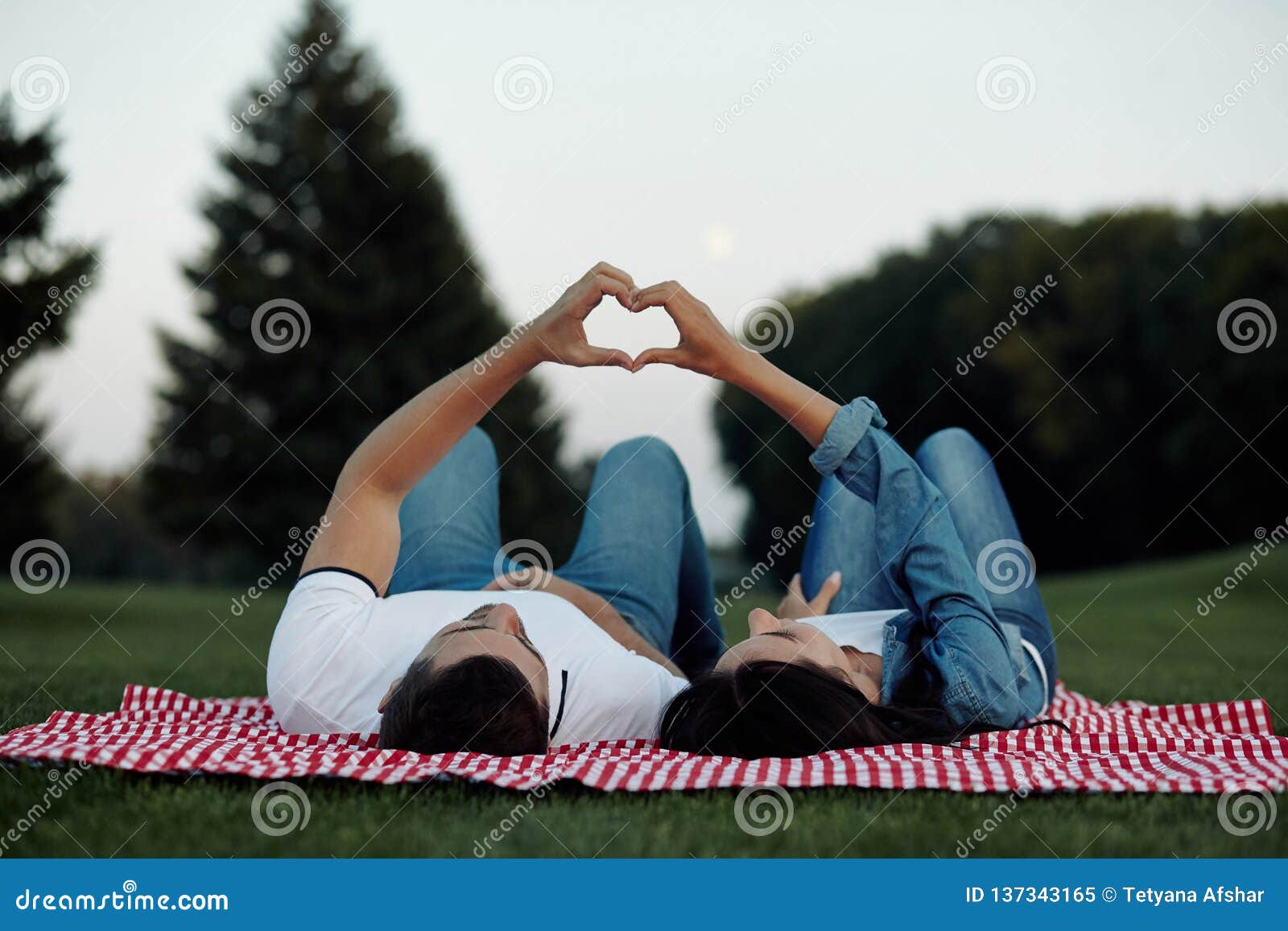 Couple Making Heart with Hands Stock Image - Image of green, boyfriend ...