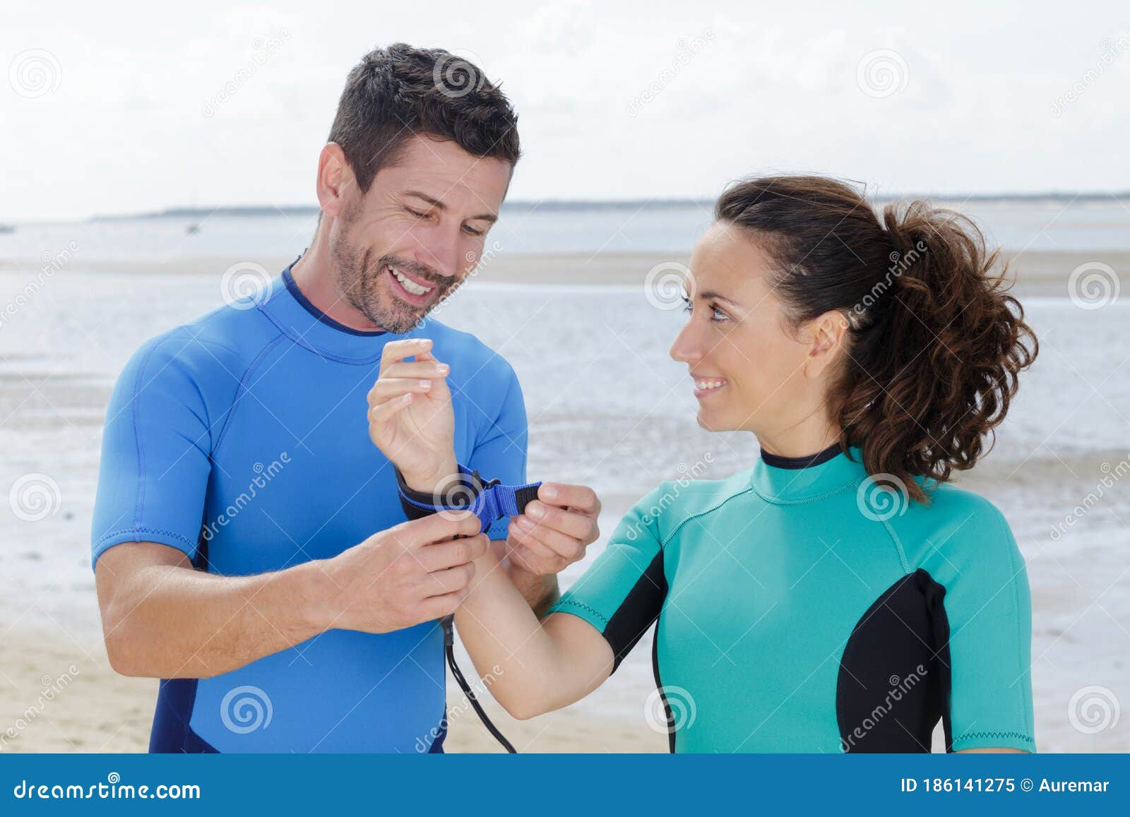 Couple Learning To Surf on Beach Near Ocean Stock Image - Image of ...