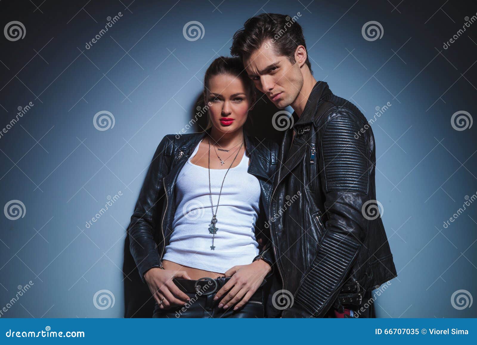 Couple in Leather Clothes Posing in Studio Stock Image - Image of blond ...