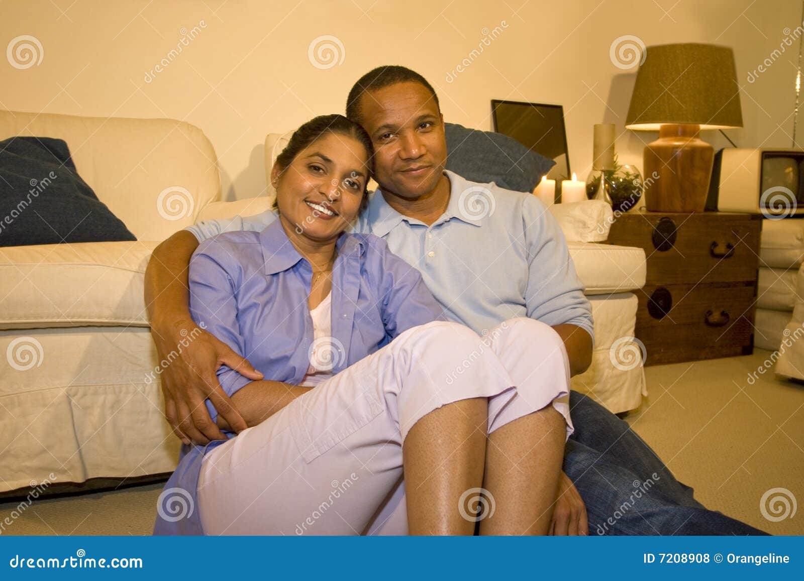 Couple in Living Room stock photo. Image of multi, black - 7208908