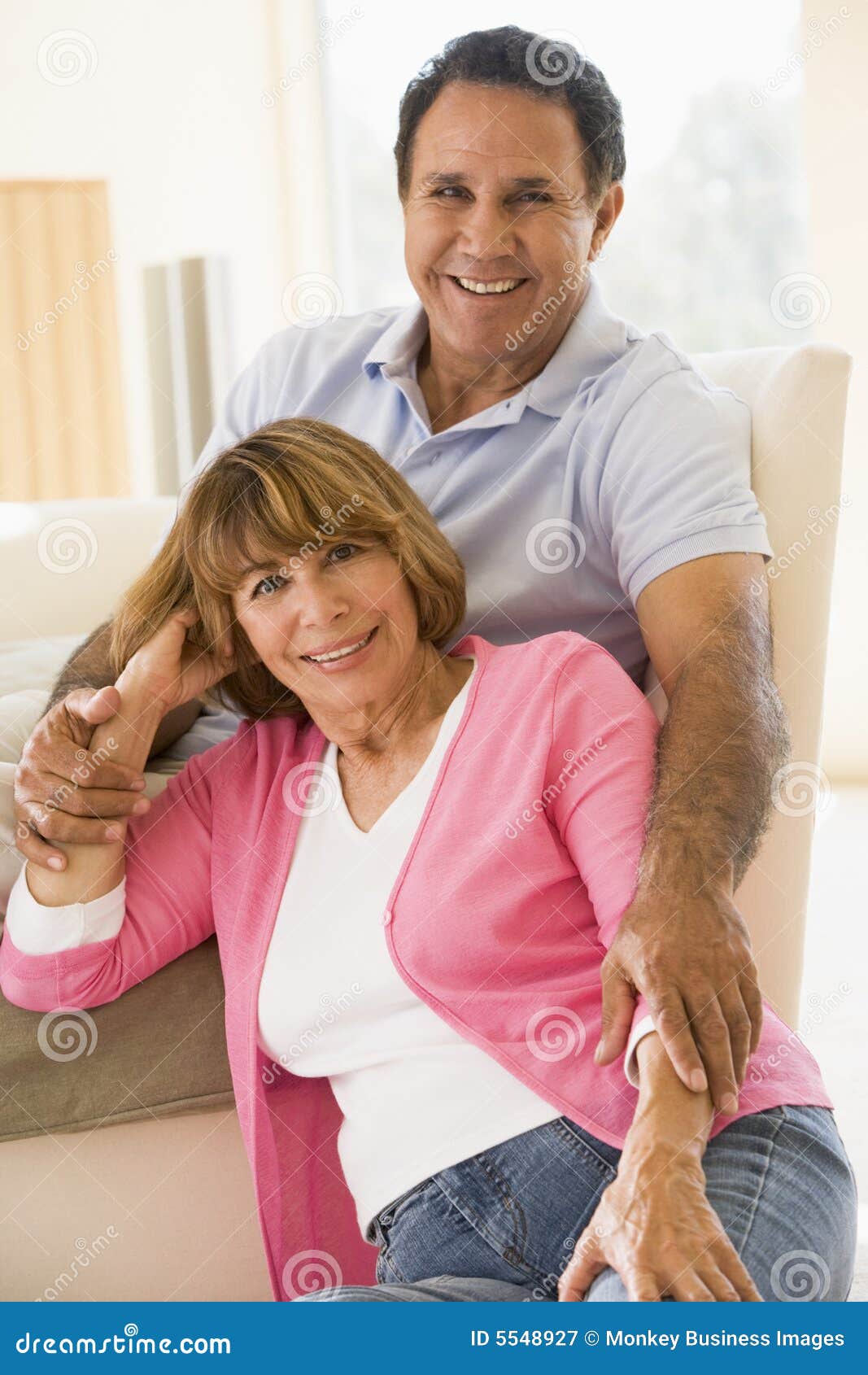 Couple in Living Room Smiling Stock Image - Image of portrait, indoors ...