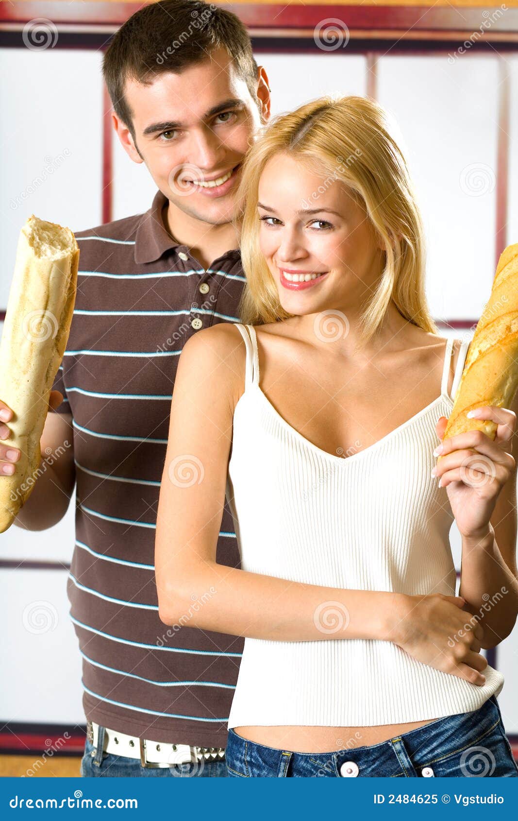 Couple with long loaf stock image. Image of laughter, cheerful - 2484625