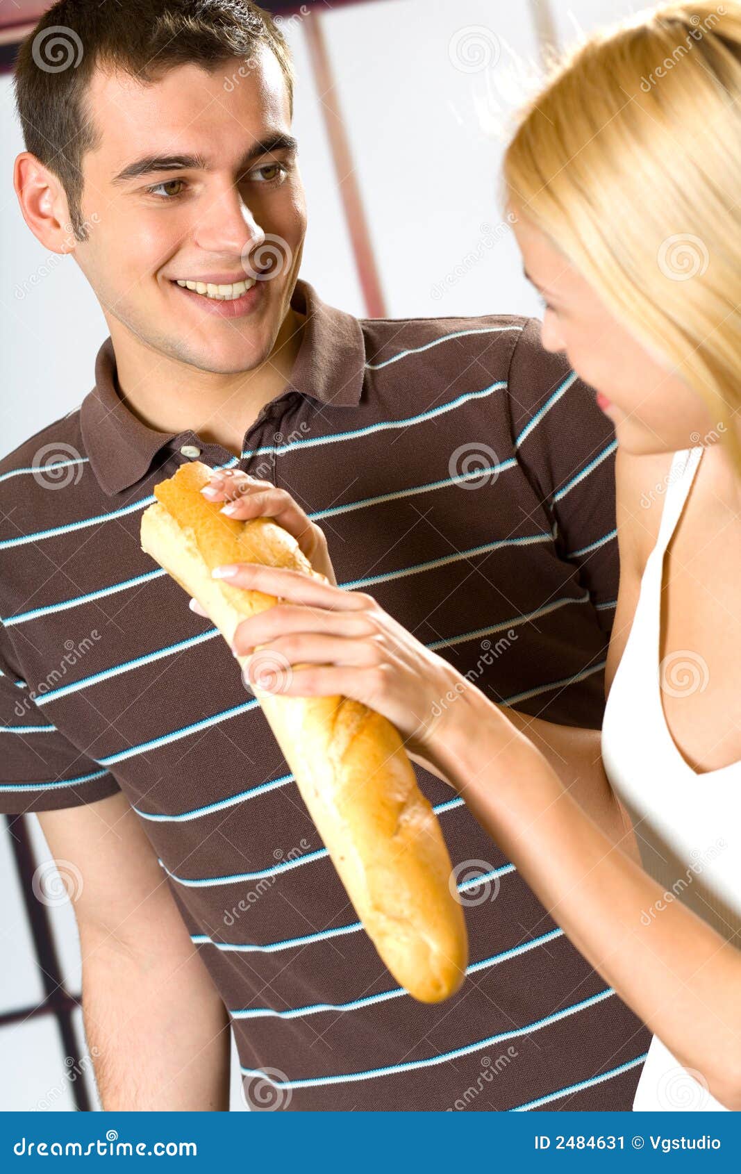 Couple with long loaf stock image. Image of cooking, leisure - 2484631