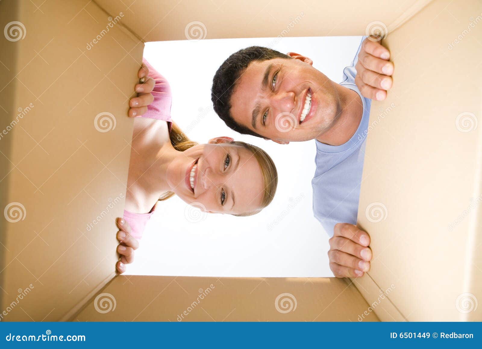Couple lookin into box stock image. Image of domestic - 6501449