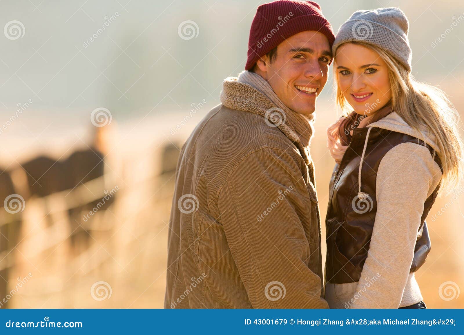 Couple looking back stock image. Image of hugging, beautiful - 43001679