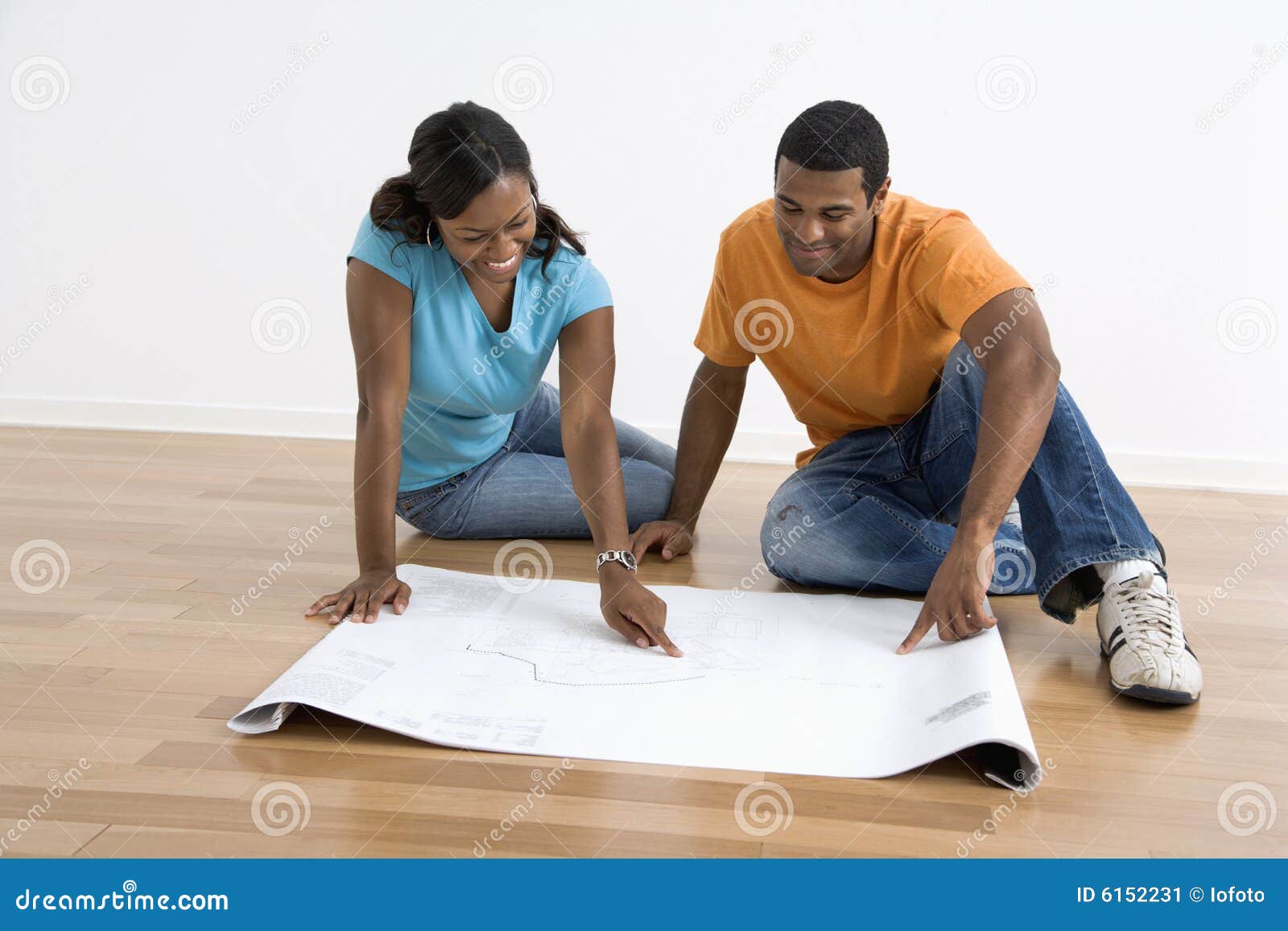 Couple Looking at Blueprints. Stock Image - Image of blueprint ...