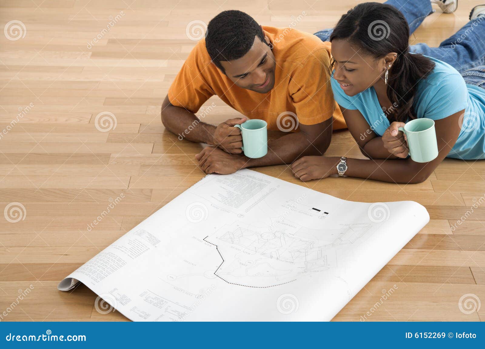 Couple Looking at Blueprints. Stock Image - Image of people, blueprint ...