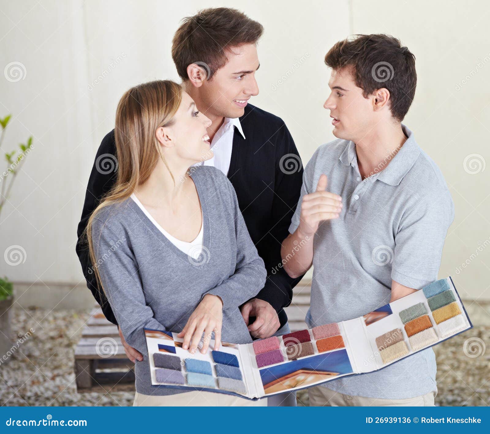 Couple Looking at Carpet Samples Stock Photo - Image of decision ...