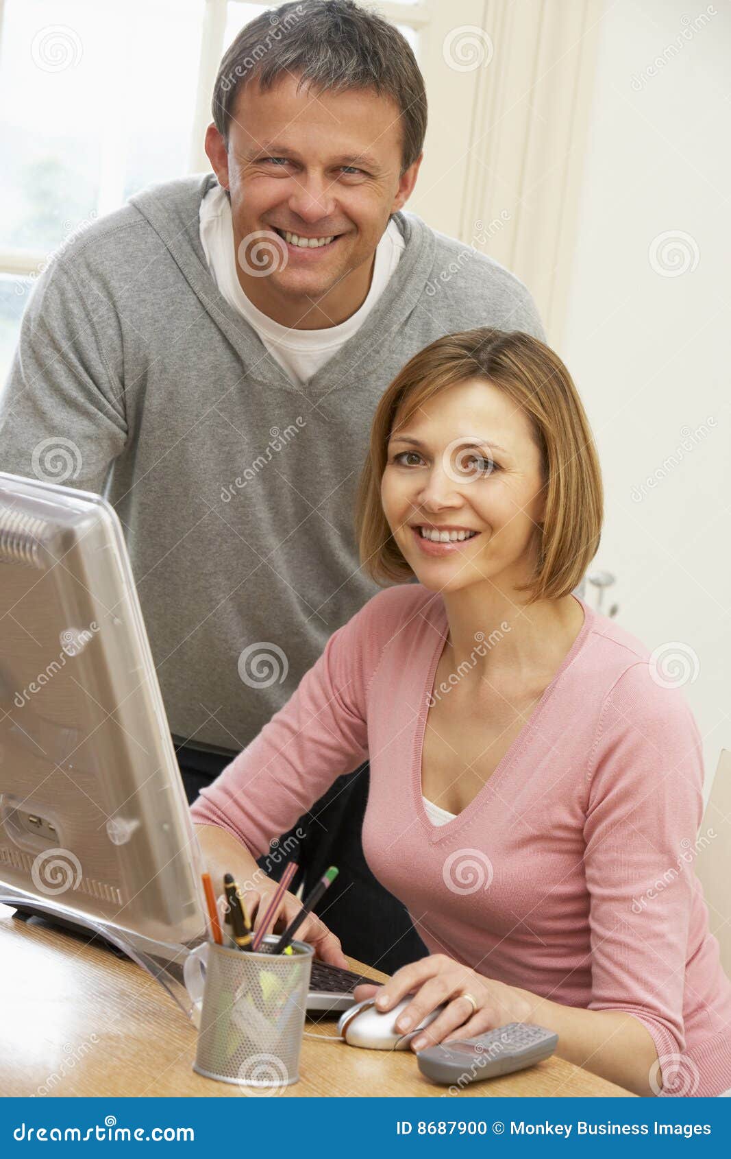 Couple Looking at Computer Screen Stock Photo - Image of commerce ...