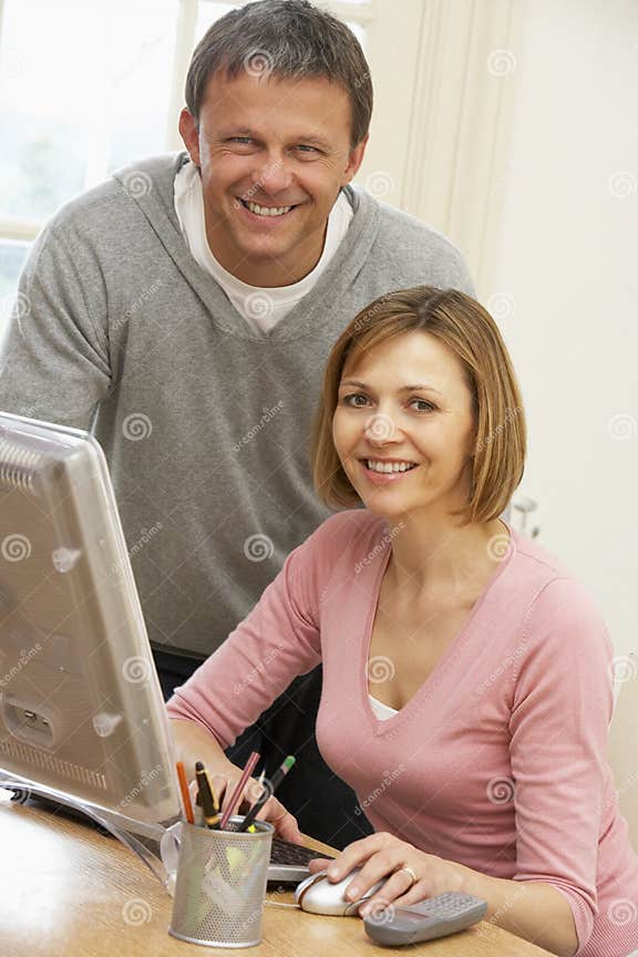 Couple Looking at Computer Screen Stock Photo - Image of commerce ...