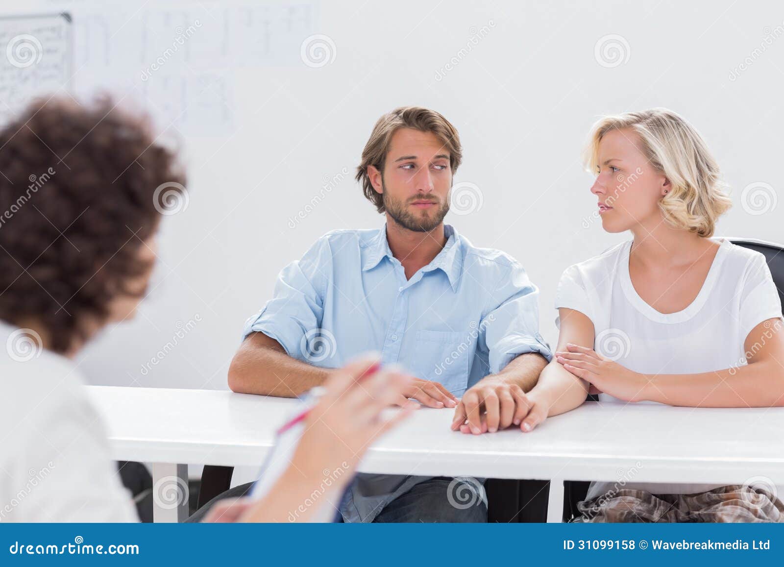 Couple Looking Doubtful during Therapy Session Stock Photo - Image of ...
