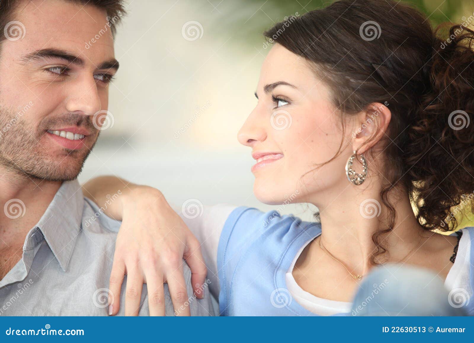 Couple Looking at Each Other Stock Image - Image of love, sofa: 22630513
