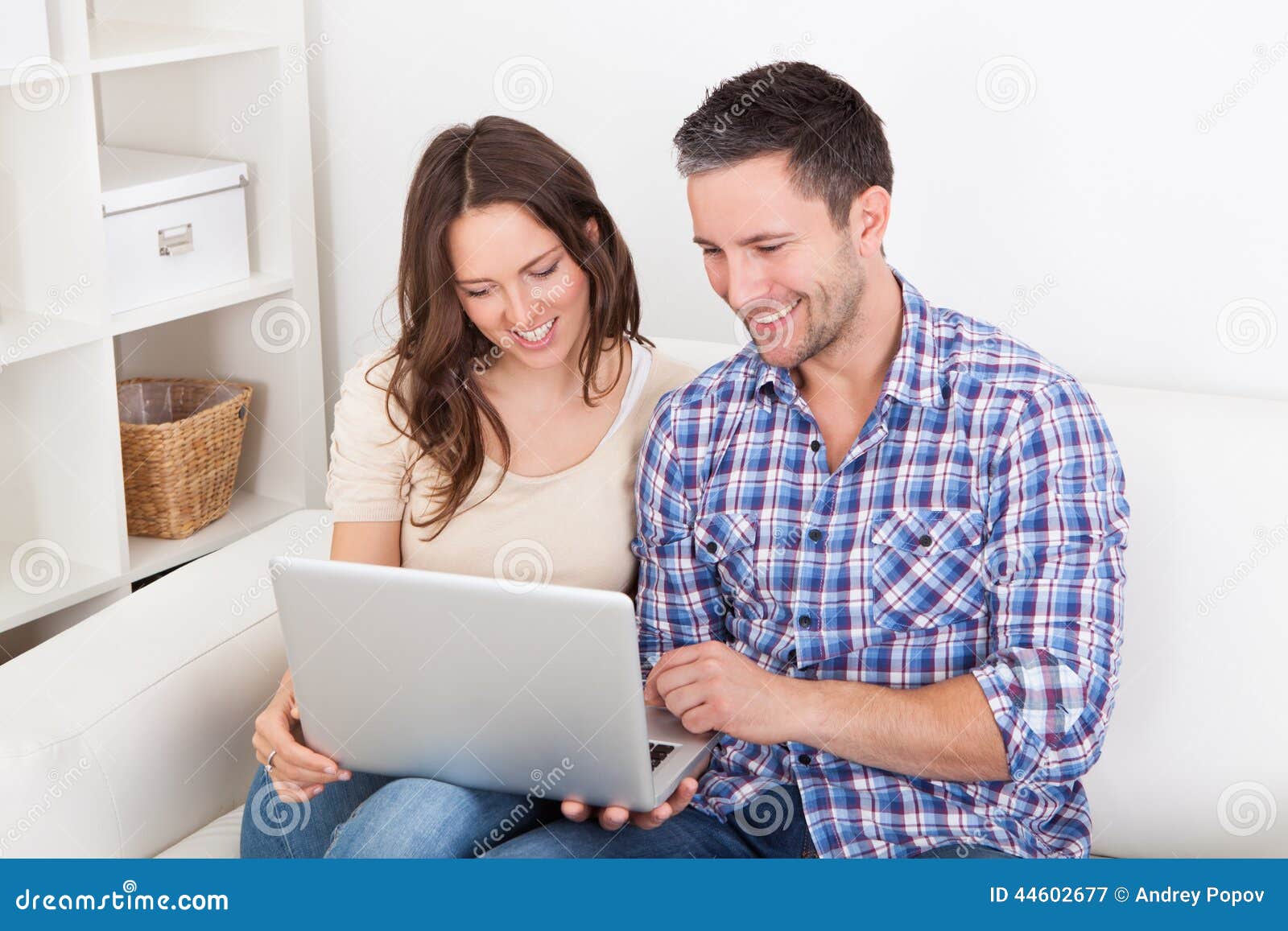 Couple looking at laptop stock image. Image of lifestyle - 44602677