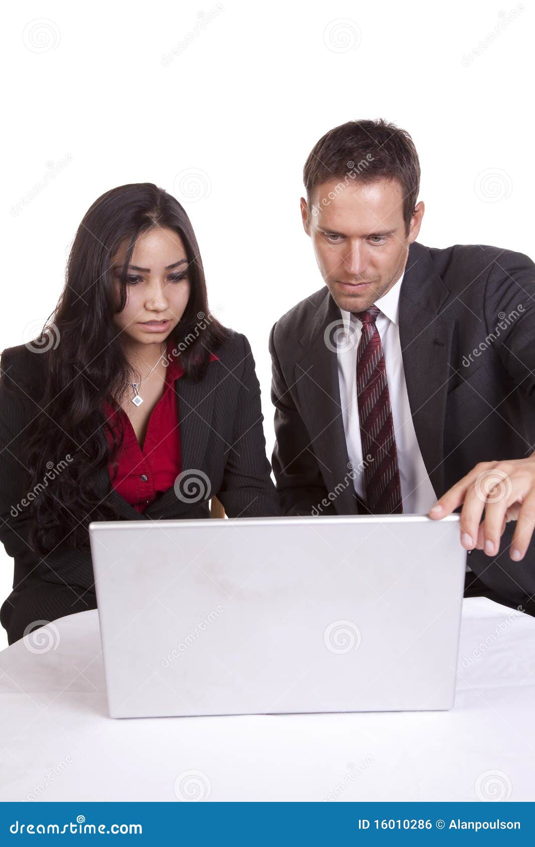 Couple Looking at Laptop Serious Stock Photo - Image of person ...