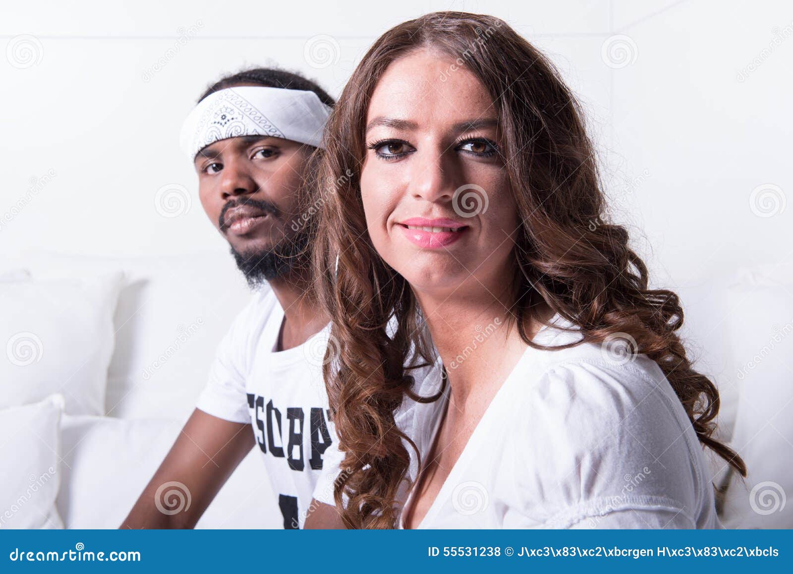 Couple Looking the Same Direction Stock Photo - Image of sitting, smile ...