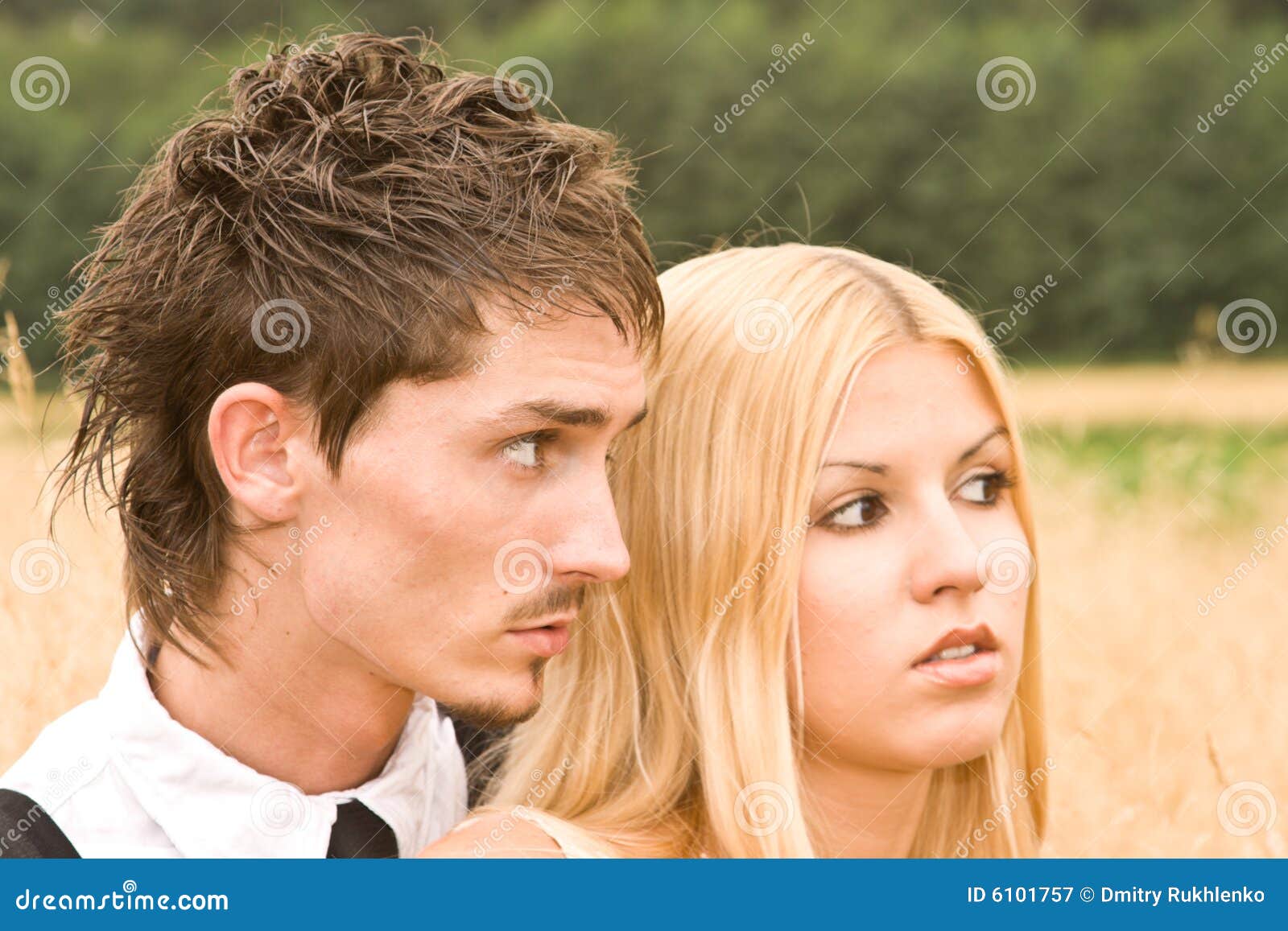 Couple Looking at Something Stock Image - Image of meadow, watching ...
