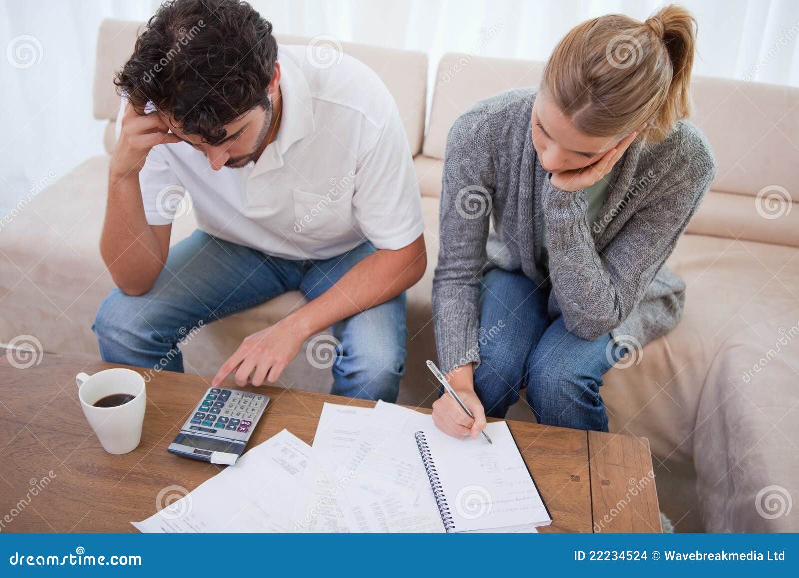 Couple Looking at Their Bills Stock Photo - Image of couch, calculator ...