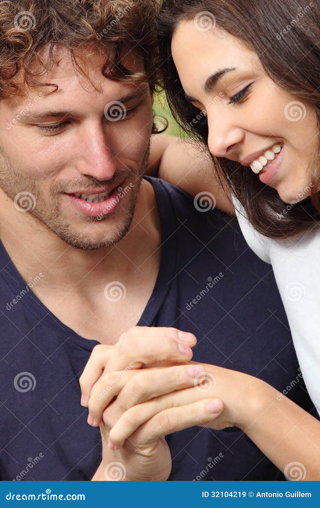 Couple looking their hands stock image. Image of embosom - 32104219