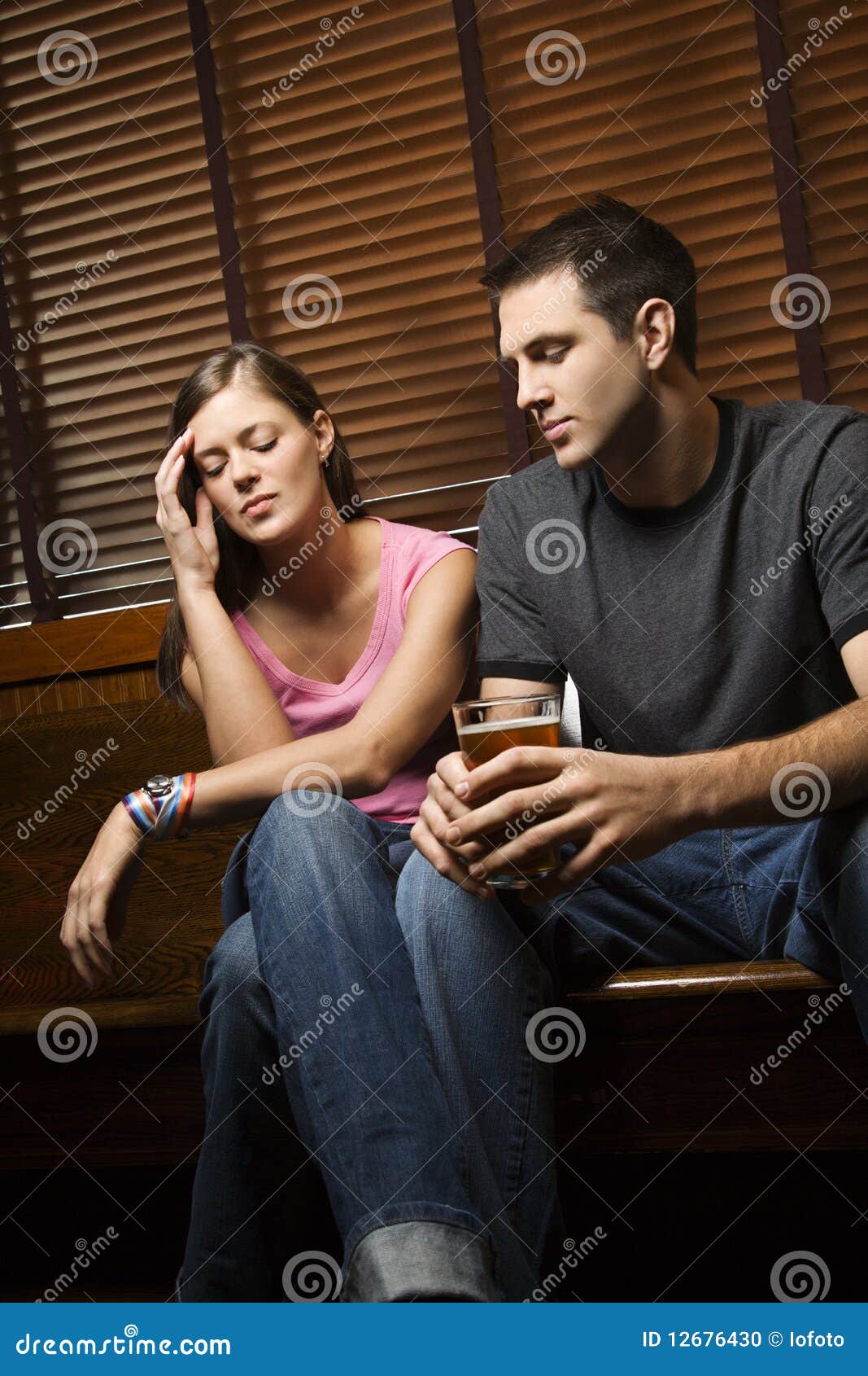 Couple Looking Uncomfortable Stock Photo - Image of drinking, male ...