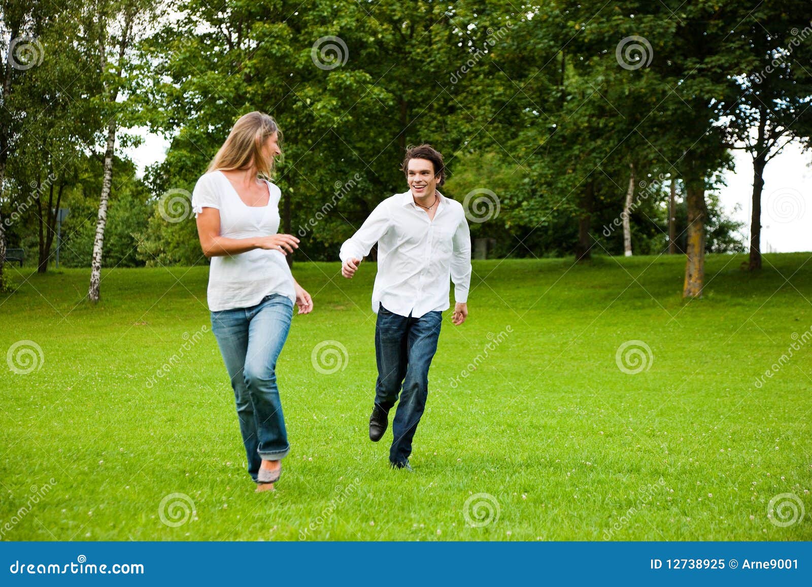 Couple in Love Chasing Each Other Stock Image - Image of running, young ...