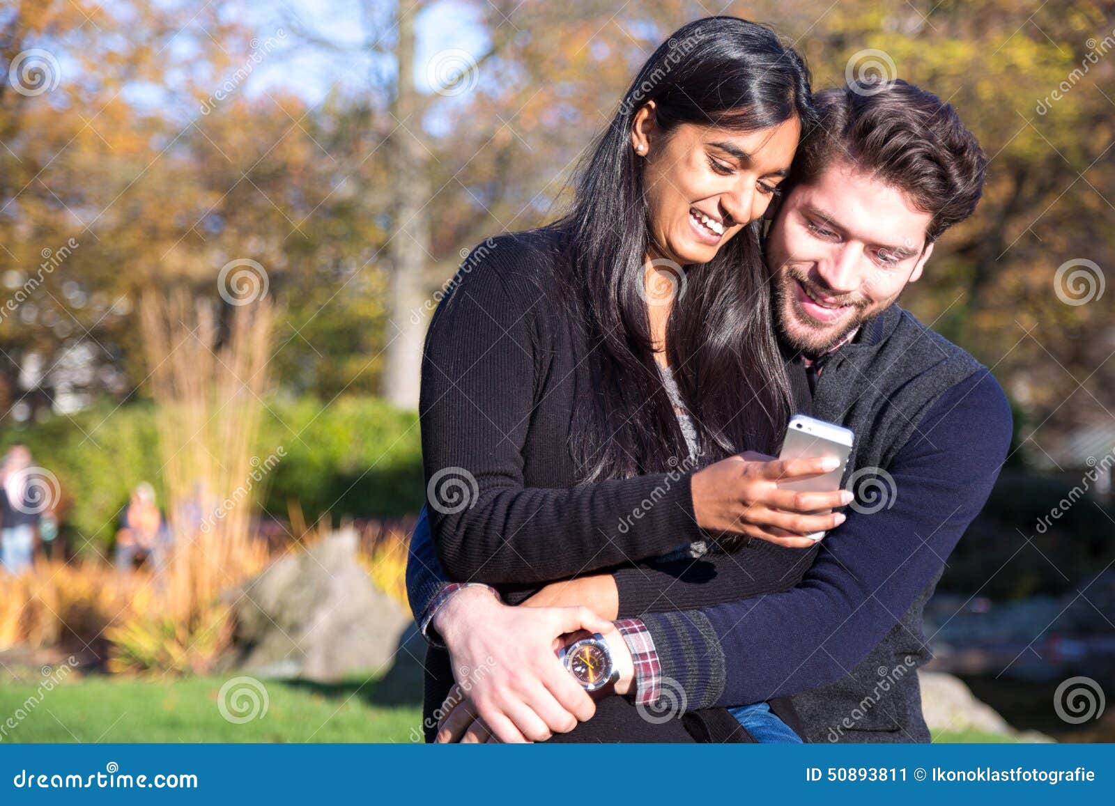Couple in Love Looking at Cellphone Stock Image - Image of lovers ...