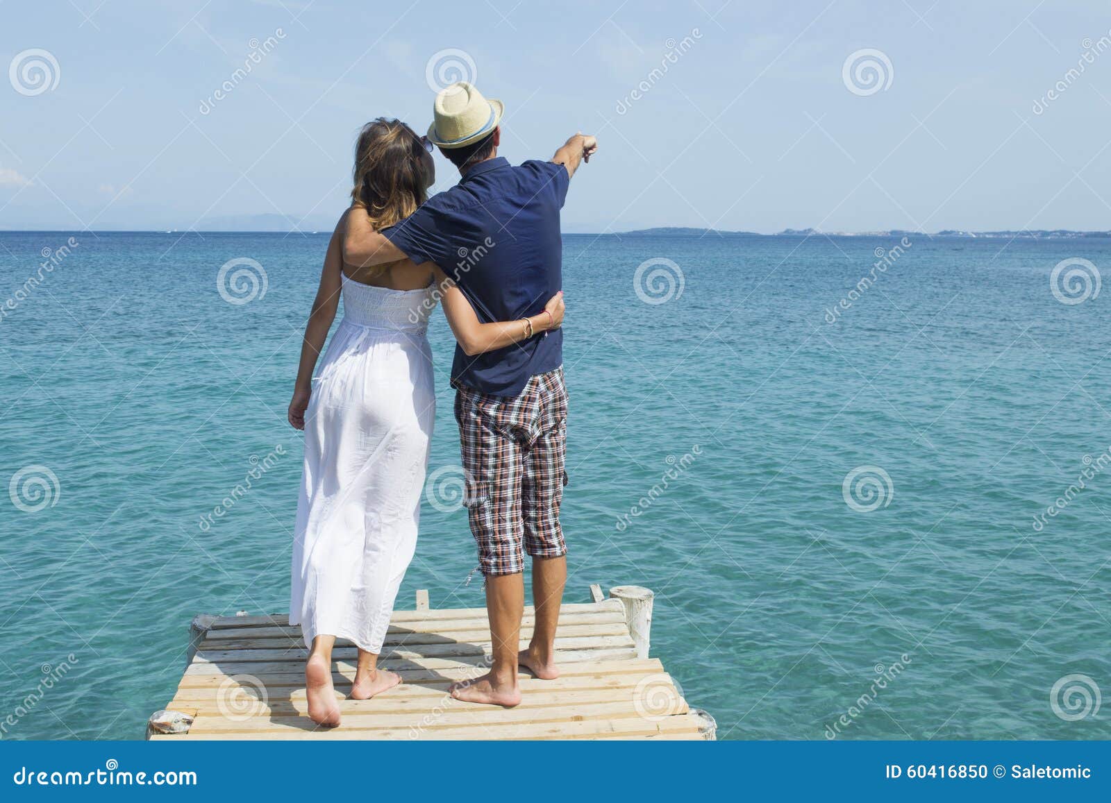 Couple in Love Looking at the Sea from a Dock Stock Photo - Image of ...