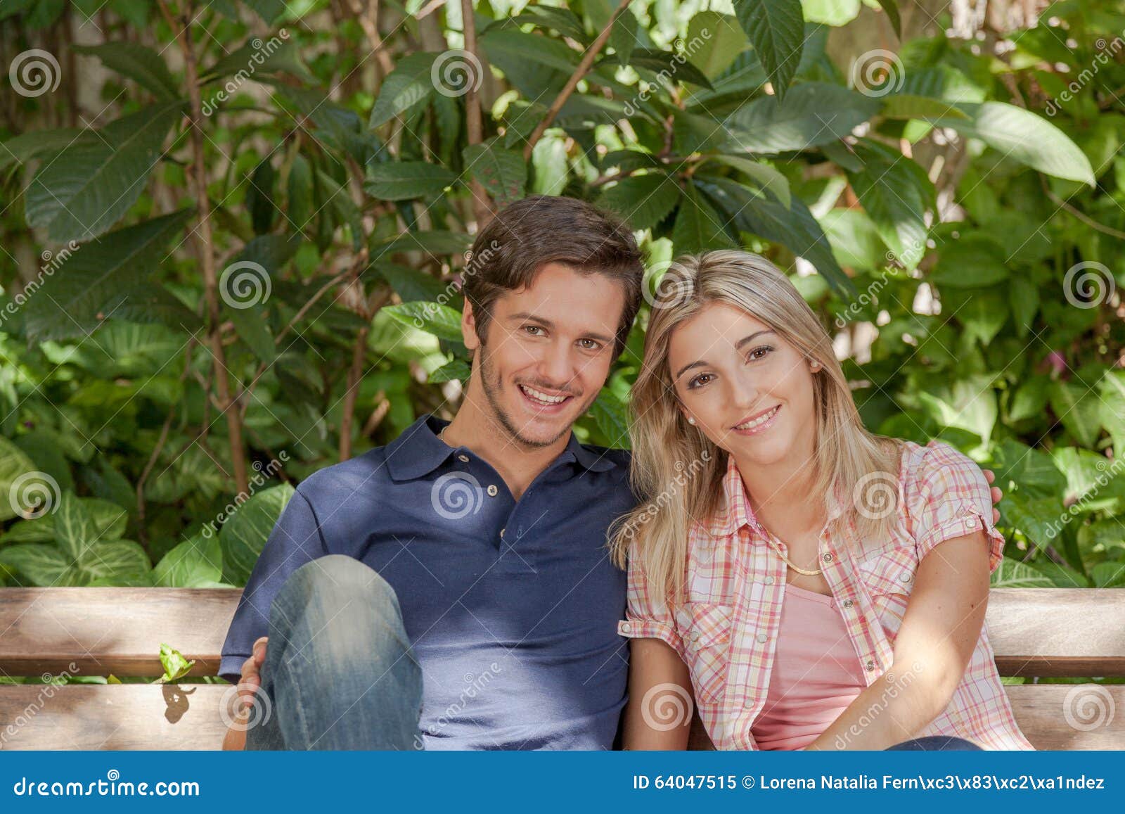 Couple in love in the park stock image. Image of property - 64047515
