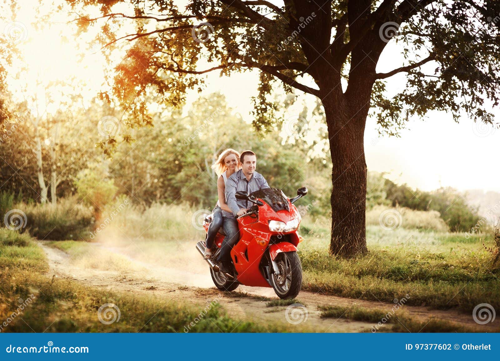 Couple in Love Rides a Motorcycle in the Park Stock Photo - Image of ...