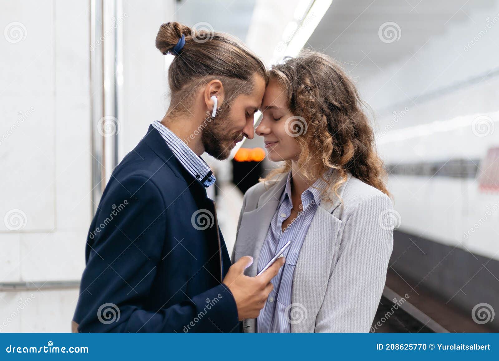 Couple in Love Standing on a Subway Platform. Stock Photo - Image of ...