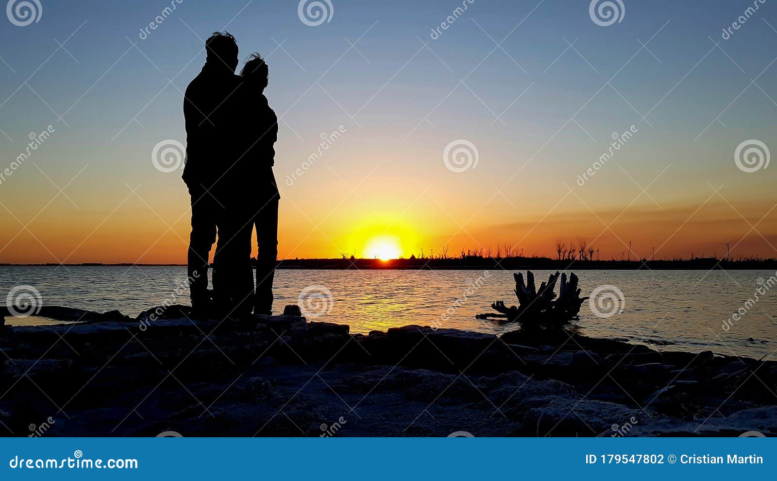 Couple in Love at Sunset by the Lake Stock Photo - Image of dusk ...