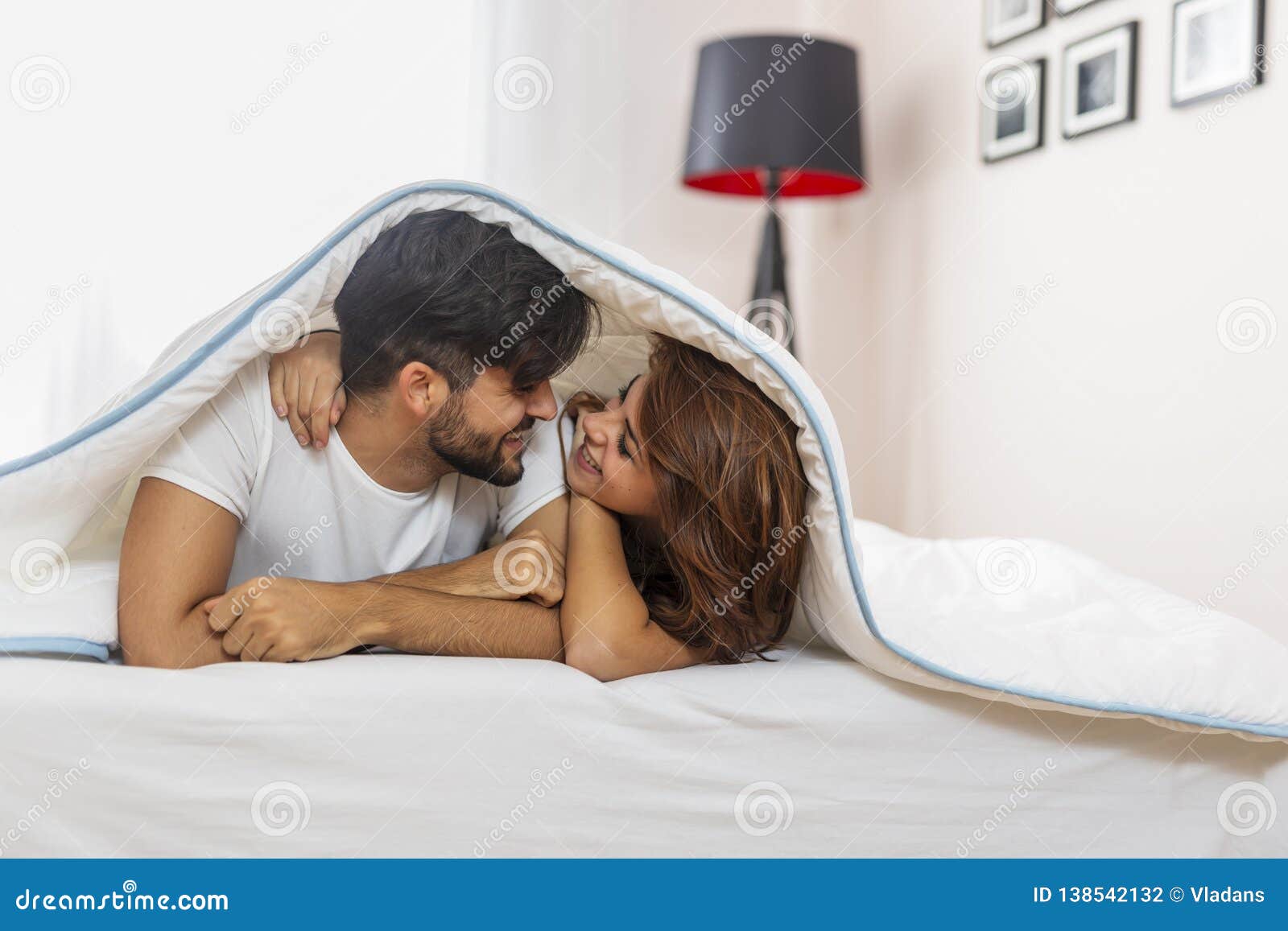 Couple in Love Under the Sheets Stock Photo - Image of awake, beautiful ...