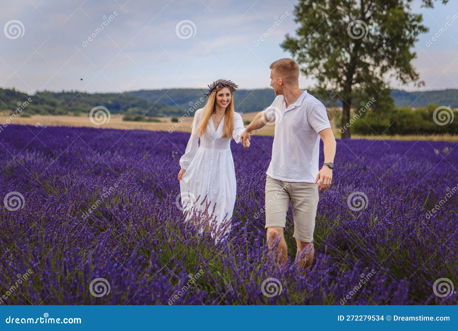 A Couple in Love is Walking in a Lavender Field Stock Photo - Image of ...
