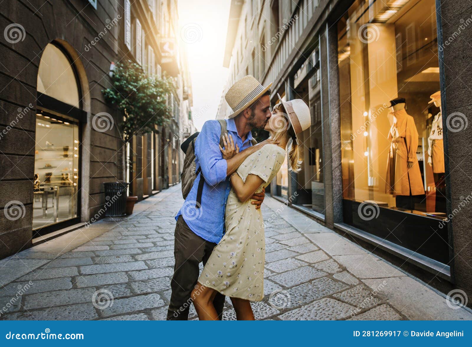 Couple Of Lovers Kissing On City Street Two Tourists Enjoying
