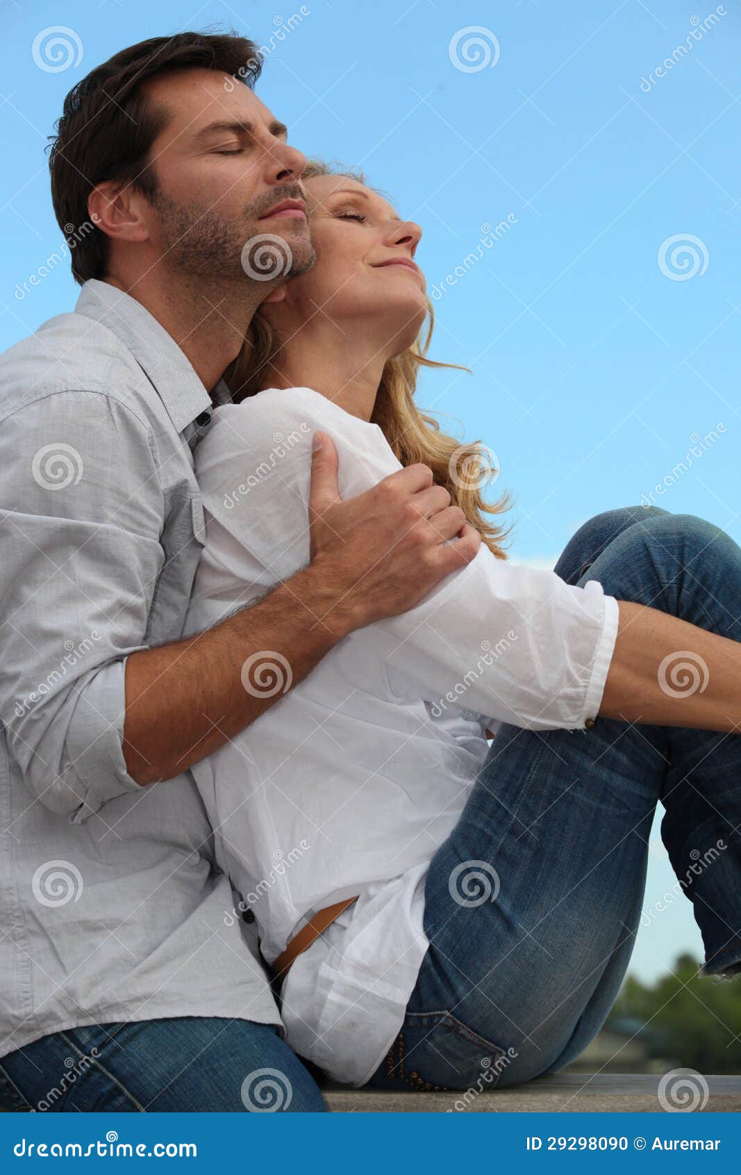Couple in a loving embrace stock photo. Image of hold - 29298090