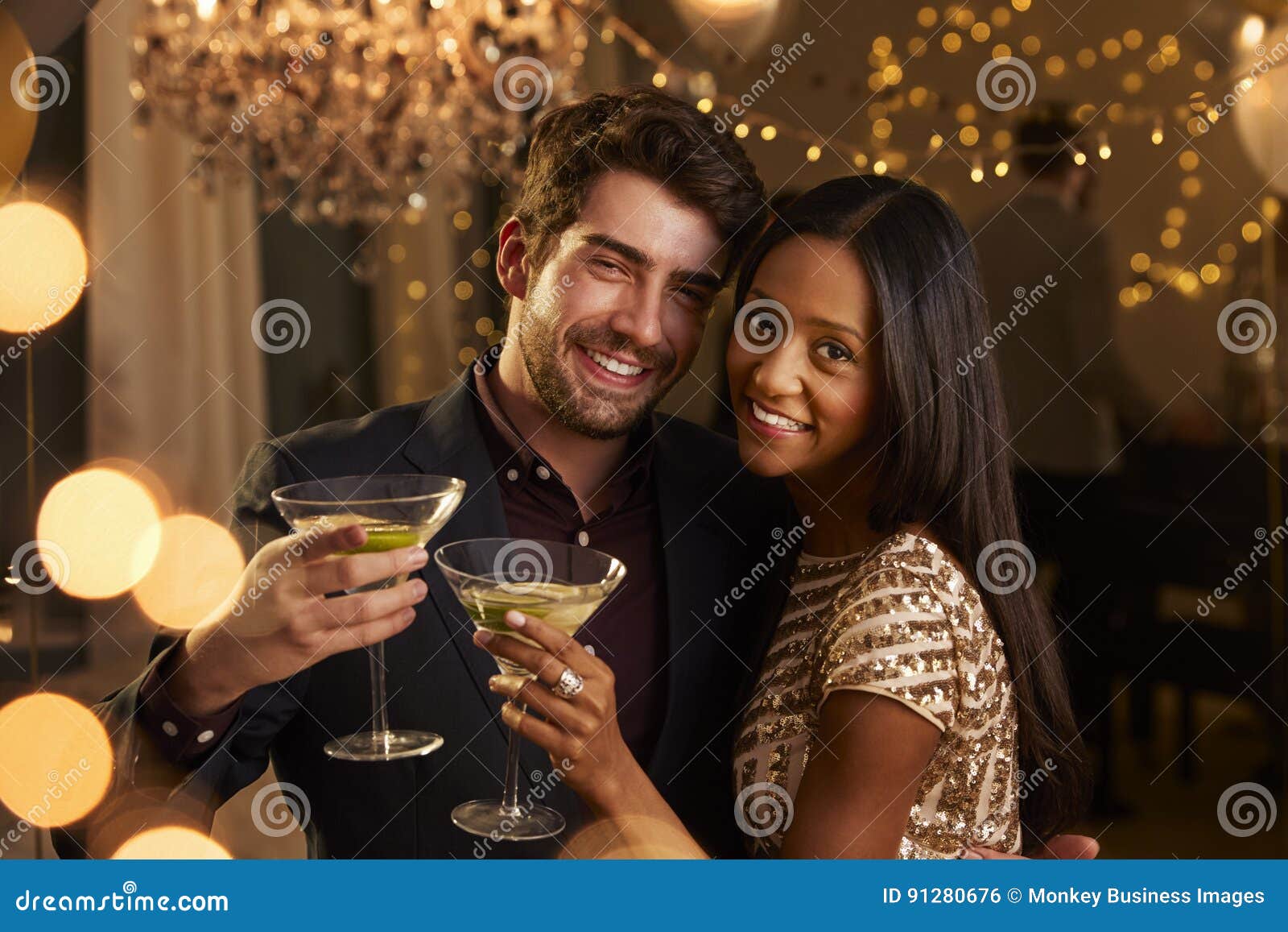 Couple Make Toast at Camera As they Celebrate at Party Stock Photo ...